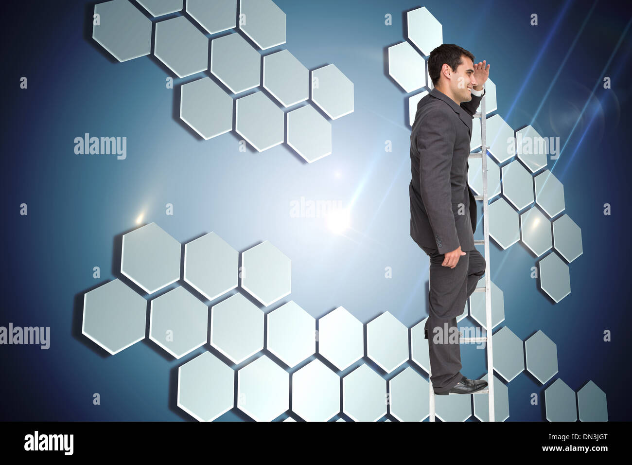 Composite image of happy businessman standing on ladder Stock Photo - Alamy