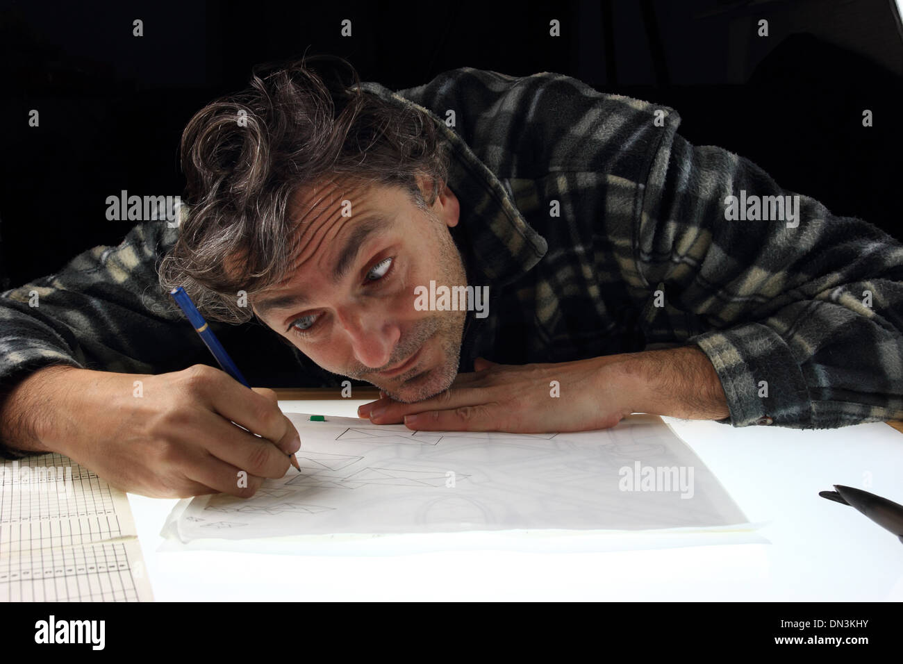 worker of the cartoon animation industry on light box Stock Photo - Alamy