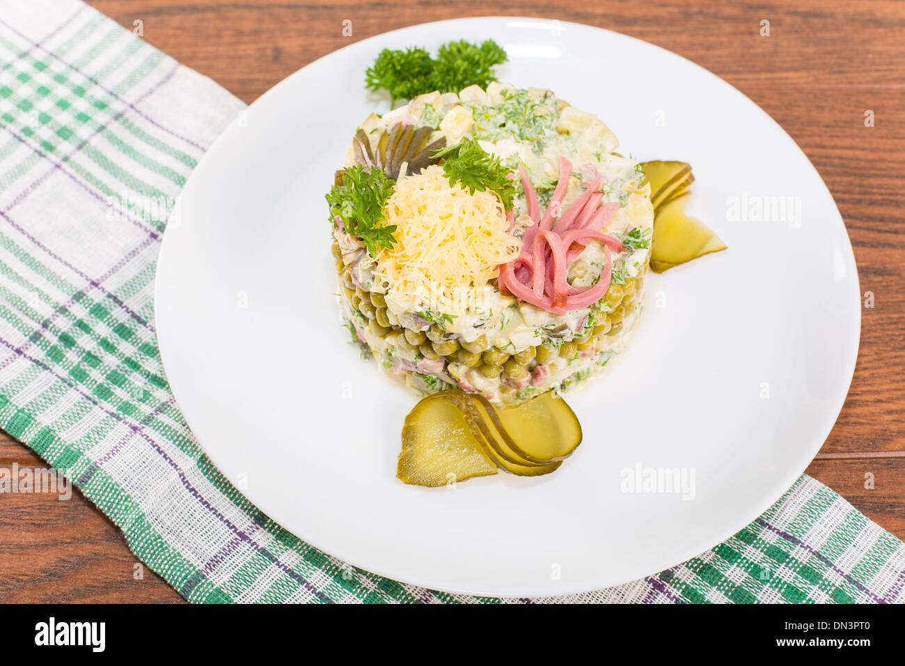 Russian salad with mayonnaise as a ring Stock Photo - Alamy