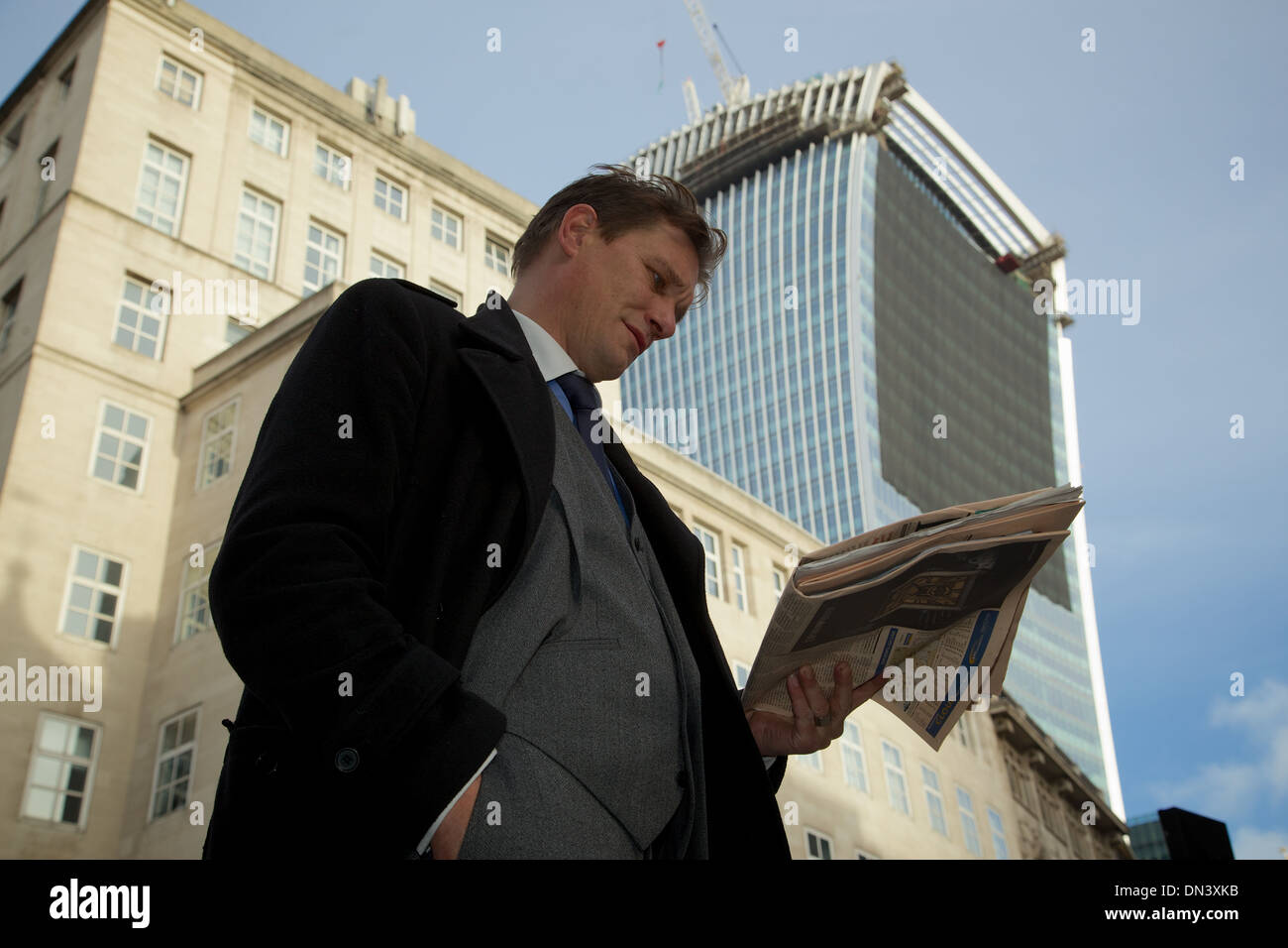 A City of London businessman reads the Financial Times with the "Walkie ...