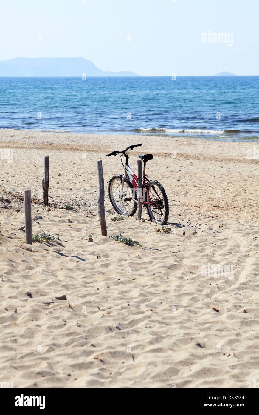 bike on a sandy beach by the sea Stock Photo - Alamy
