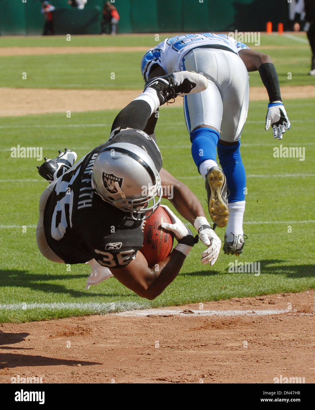 Oakland Raiders Justin Griffith dives into the end zone for the 4th ...