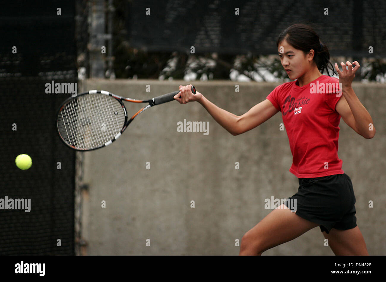 Elena Pan, of Albany, returns a shot during her singles championship ...