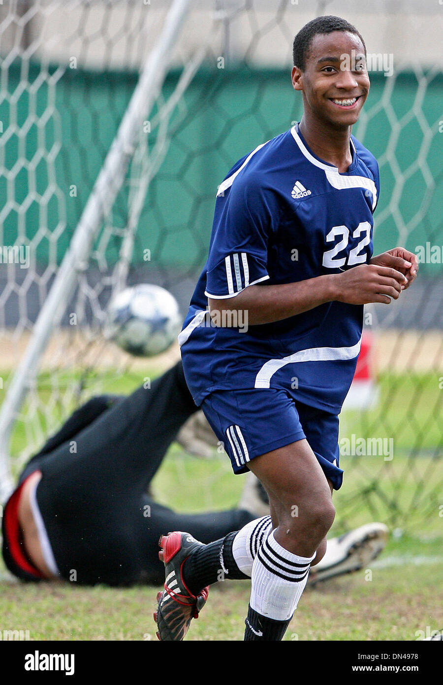 SPORTS D J Kee turns away after watching his shot on goal slip past the ...