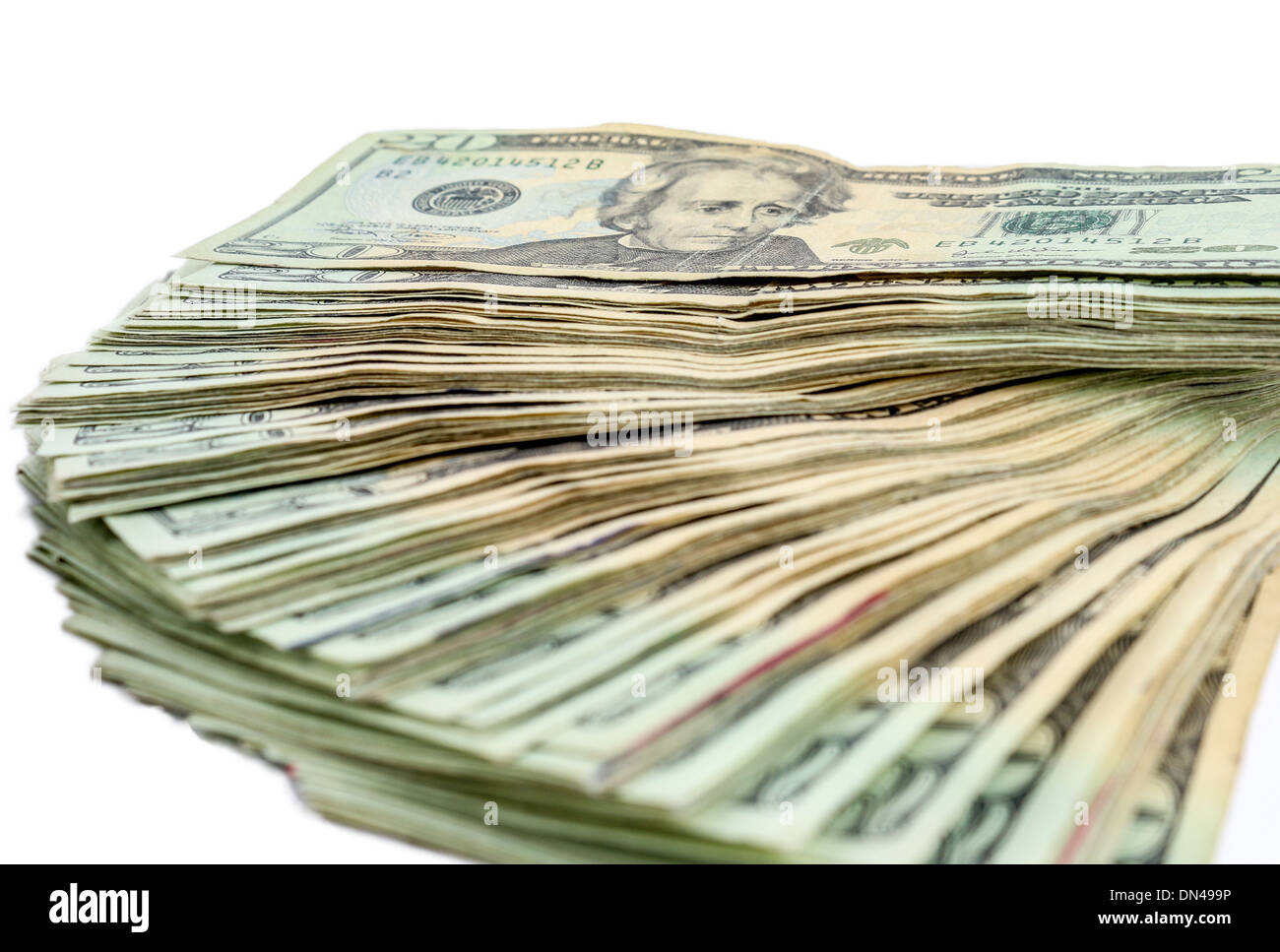 A fan of US dollars bills isolated on white background Stock Photo - Alamy