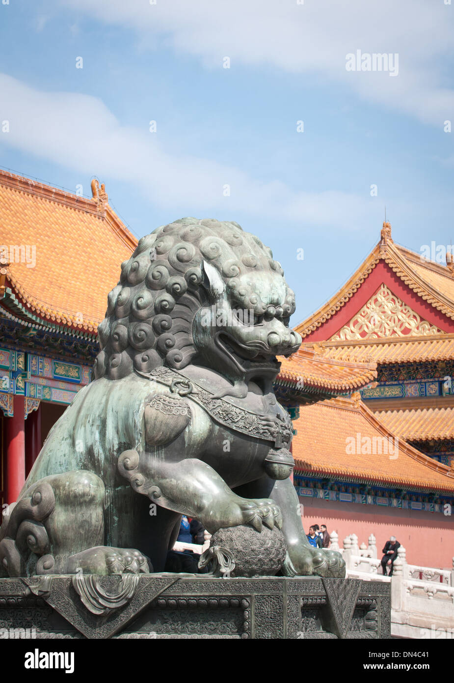 Traditional guardian lion bronze statue in front of Gate of Supreme ...