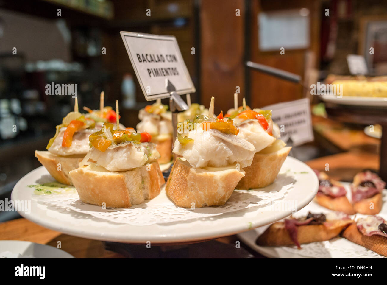 Typical Pintxos, also called tapas at popular San Sebastian bar, Basque ...
