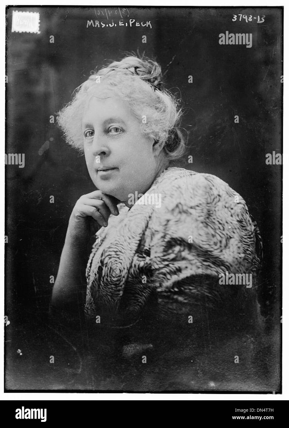 This historical photograph from the Library of Congress shows Mrs. J.E ...