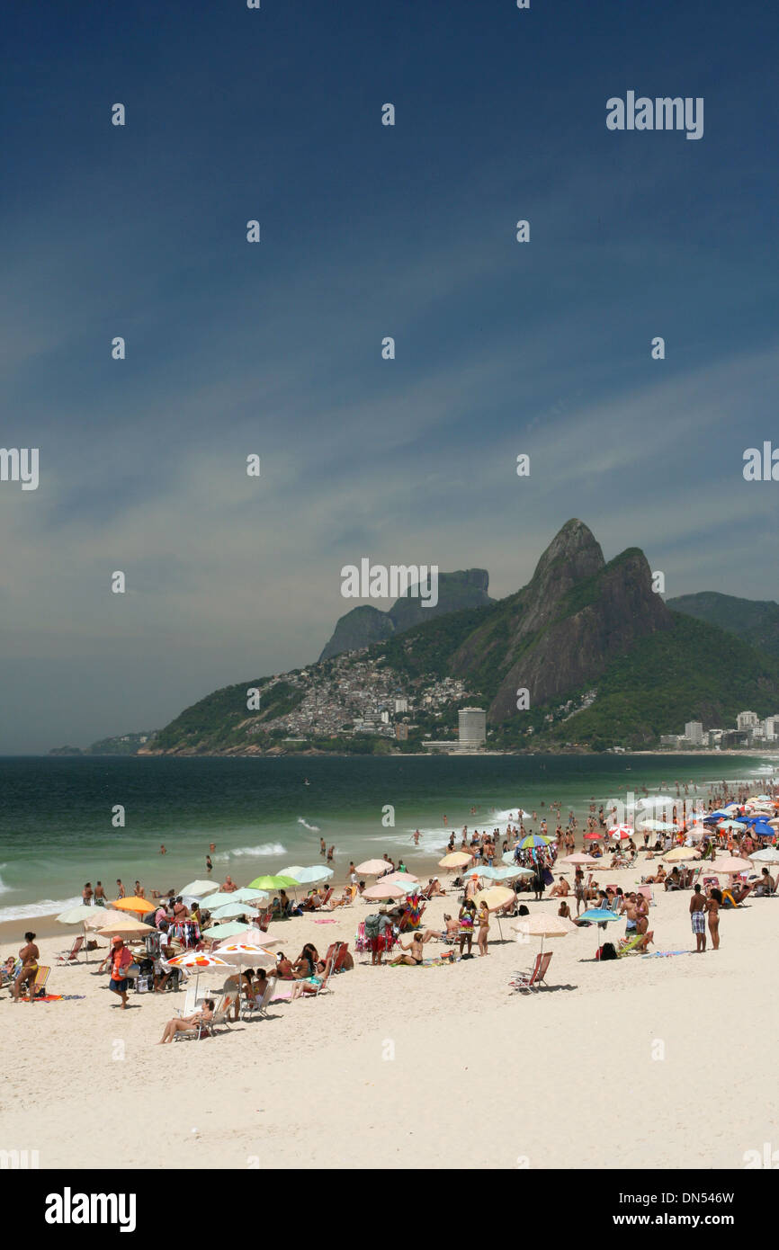 Sunbathers enjoy Ipanema Beach in a sunny spring morning. Rio de ...