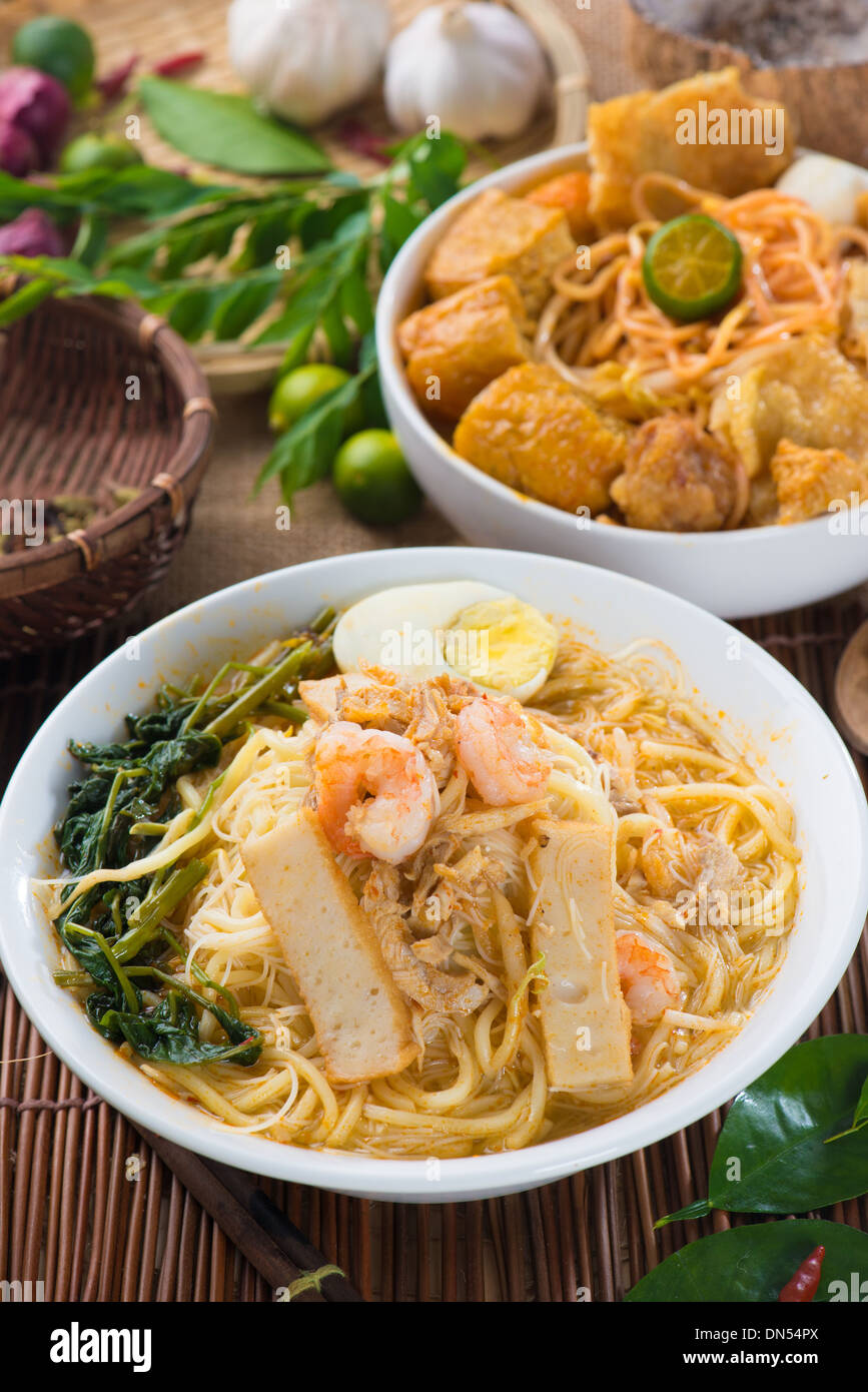 Singapore famous curry noodle or laksa mee with decorations on ...