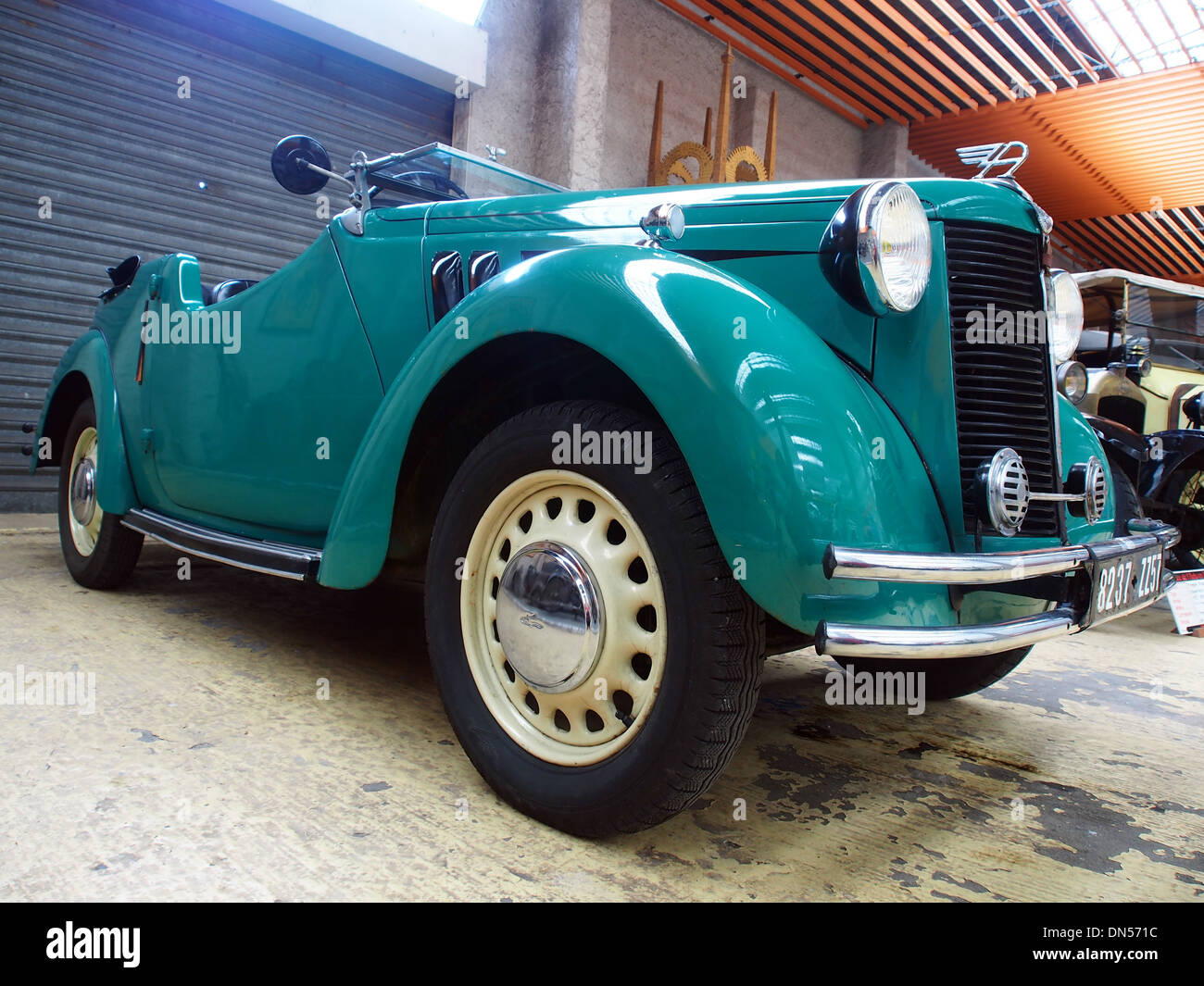The Green Austin Convertible is a vintage car that highlights the ...