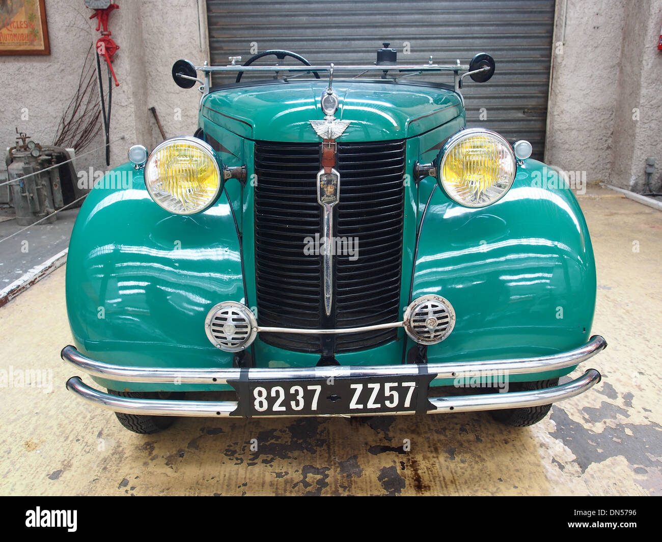 The green Austin convertible is a classic car, known for its ...