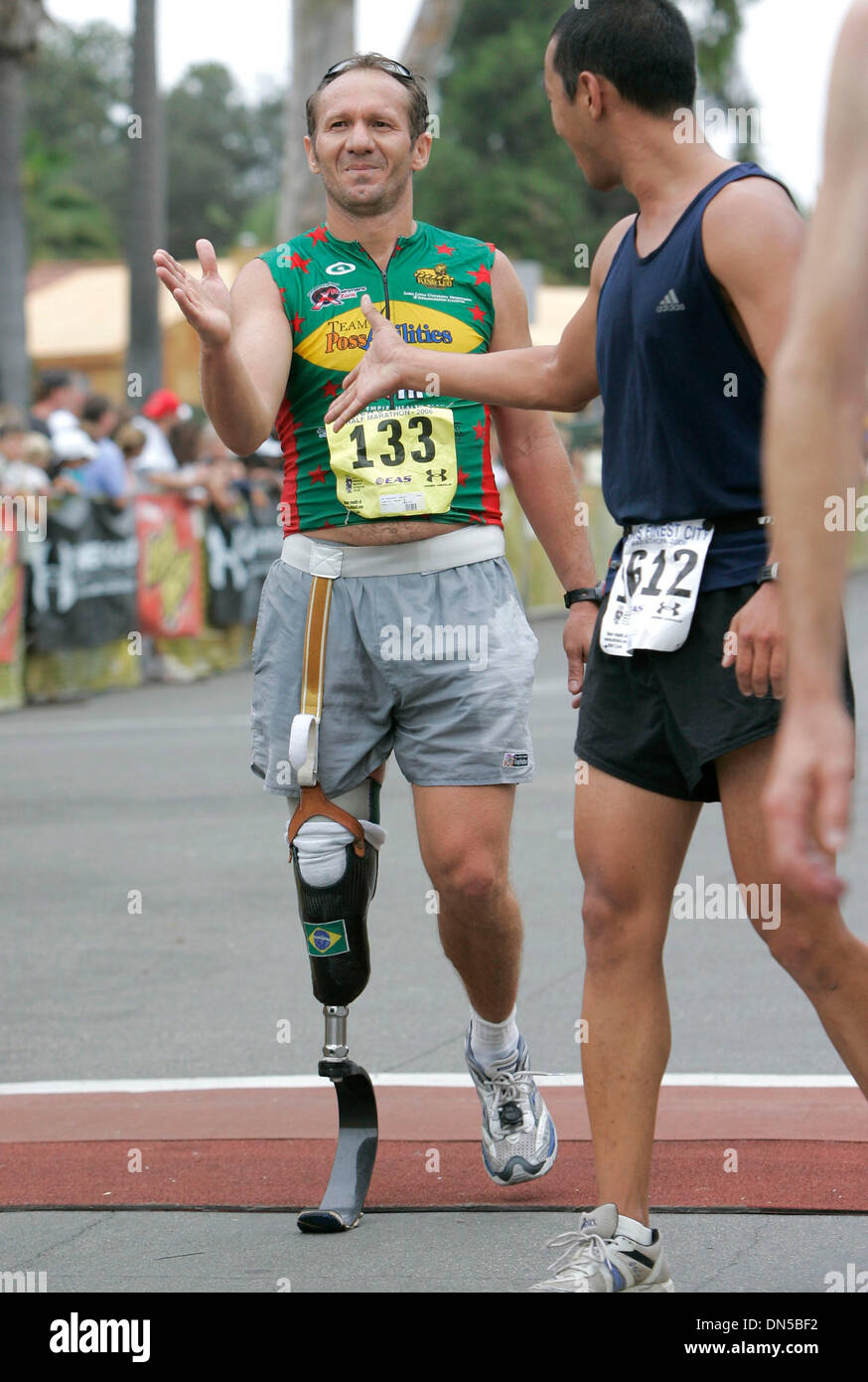 Runner reaching finish line hi-res stock photography and images - Alamy