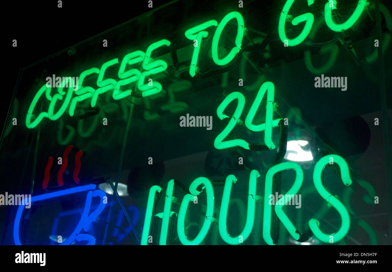 Green blue neon sign - Coffee to go twenty four hours Stock Photo - Alamy