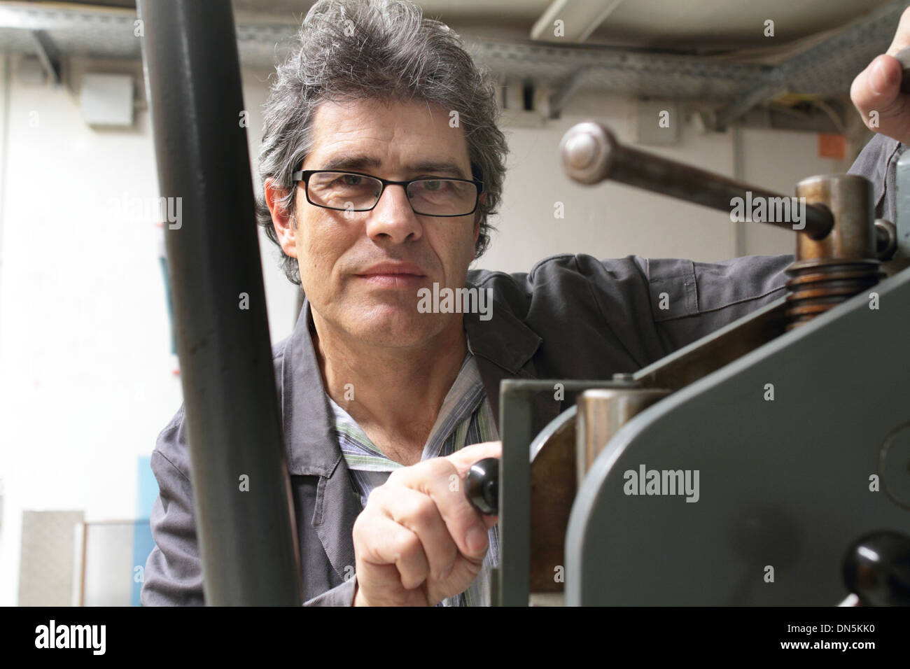 A technical worker engineer is working in factory or workshop Stock ...