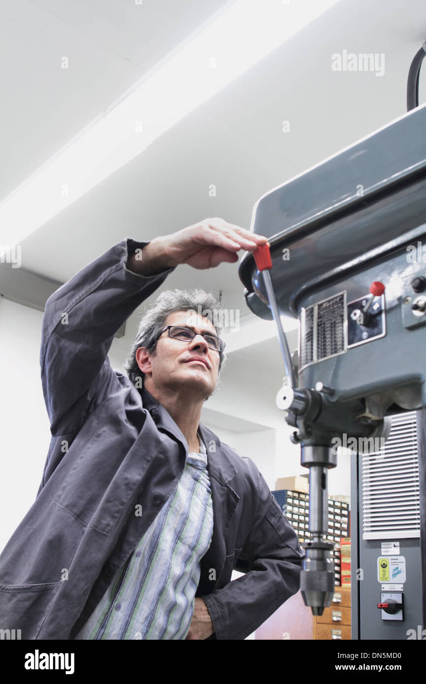 A technical worker engineer is working in factory or workshop Stock ...