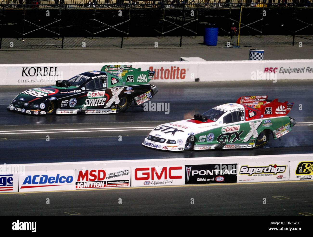 SUNDAY JULY 30, 2006 NAPA, CA. - John Force falls behind Eric Medlen in ...