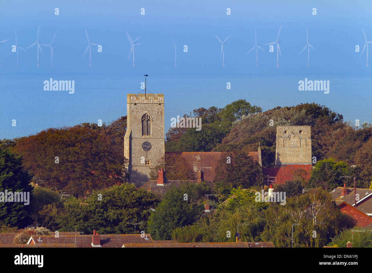 Church and Sheringham Shoal wind farm in the North sea from Weybourne ...