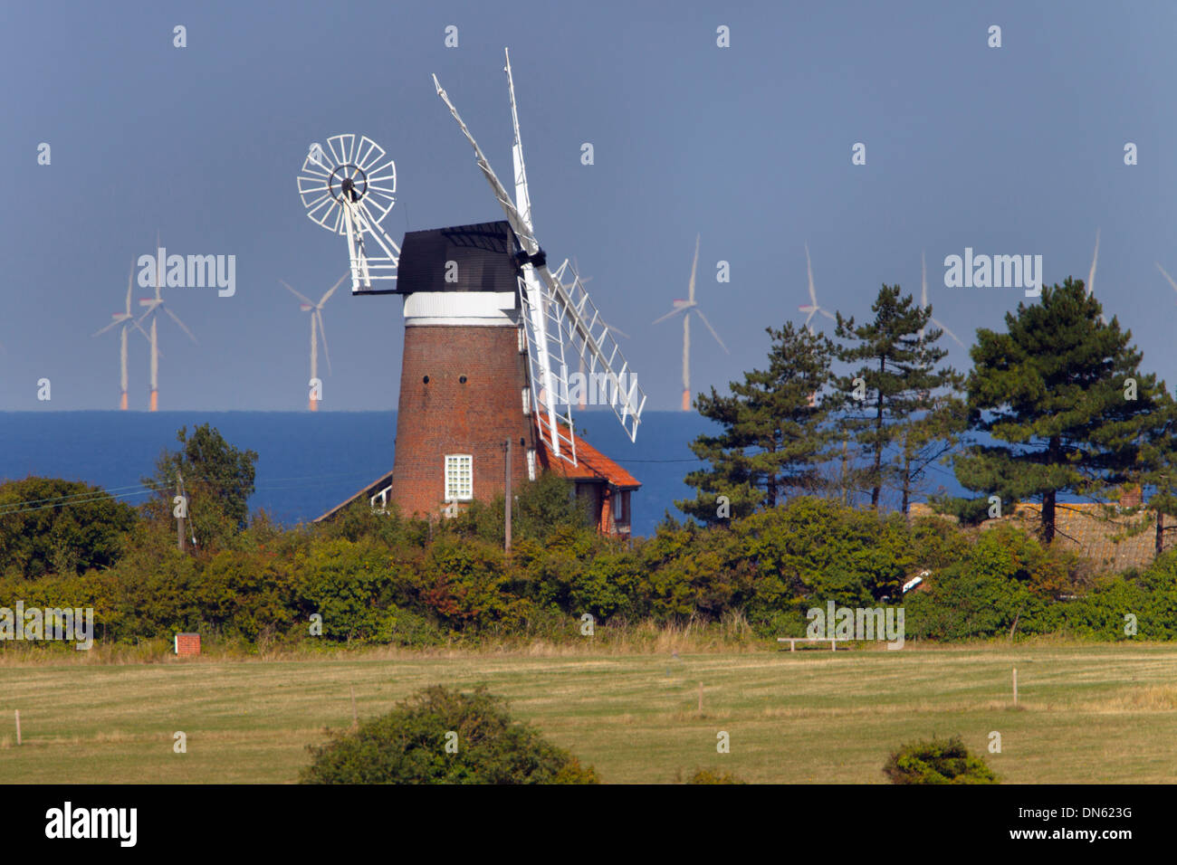 Windmill and Sheringham Shoal wind farm in the North sea at Weybourne ...
