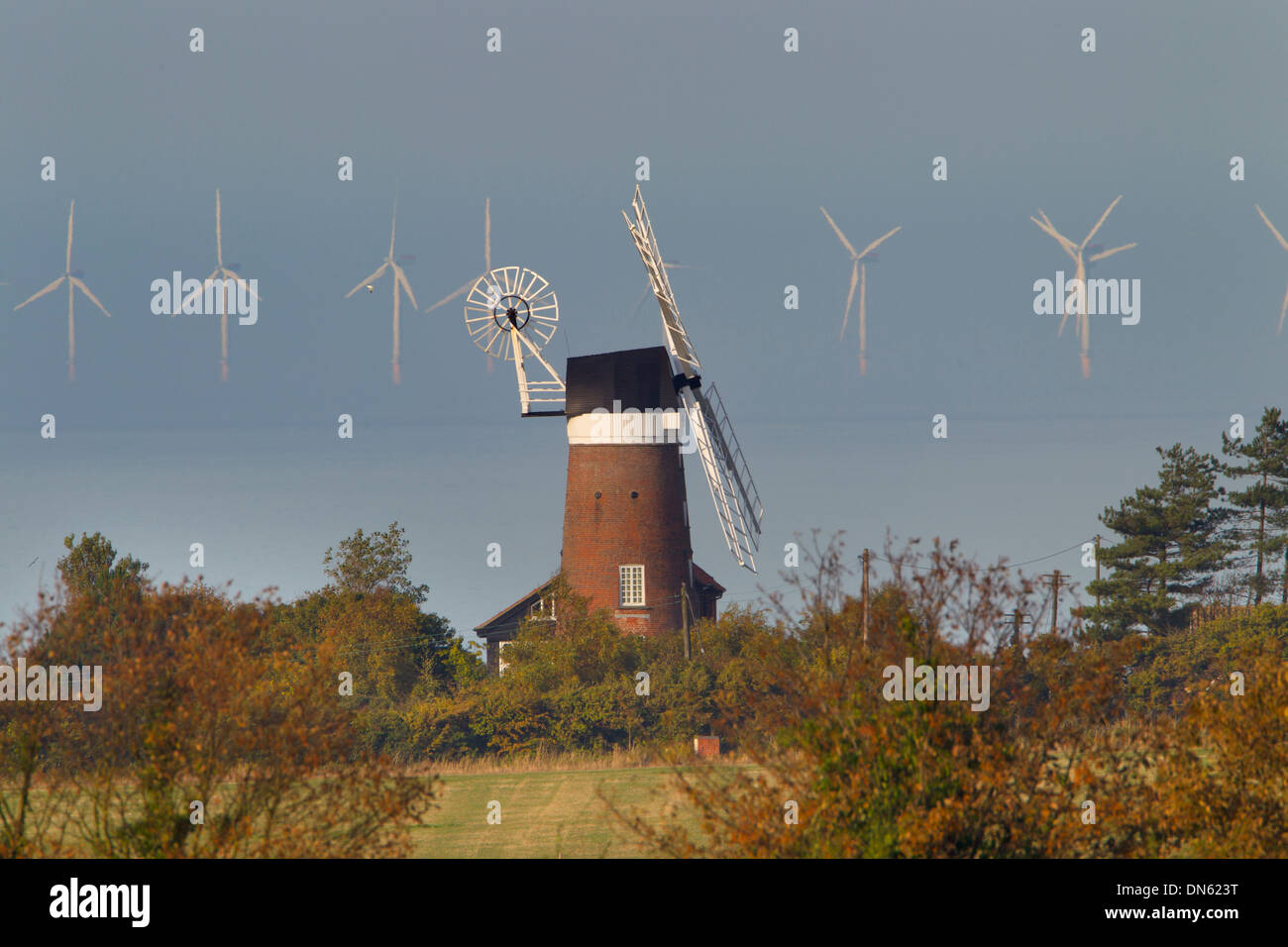 Windmill and Sheringham Shoal wind farm in the North sea at Weybourne ...