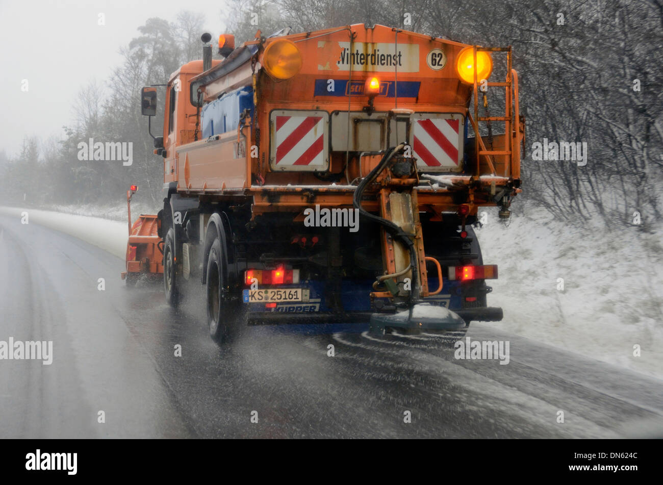 Winter services vehicle spreading salt on a motorway, Germany Stock ...
