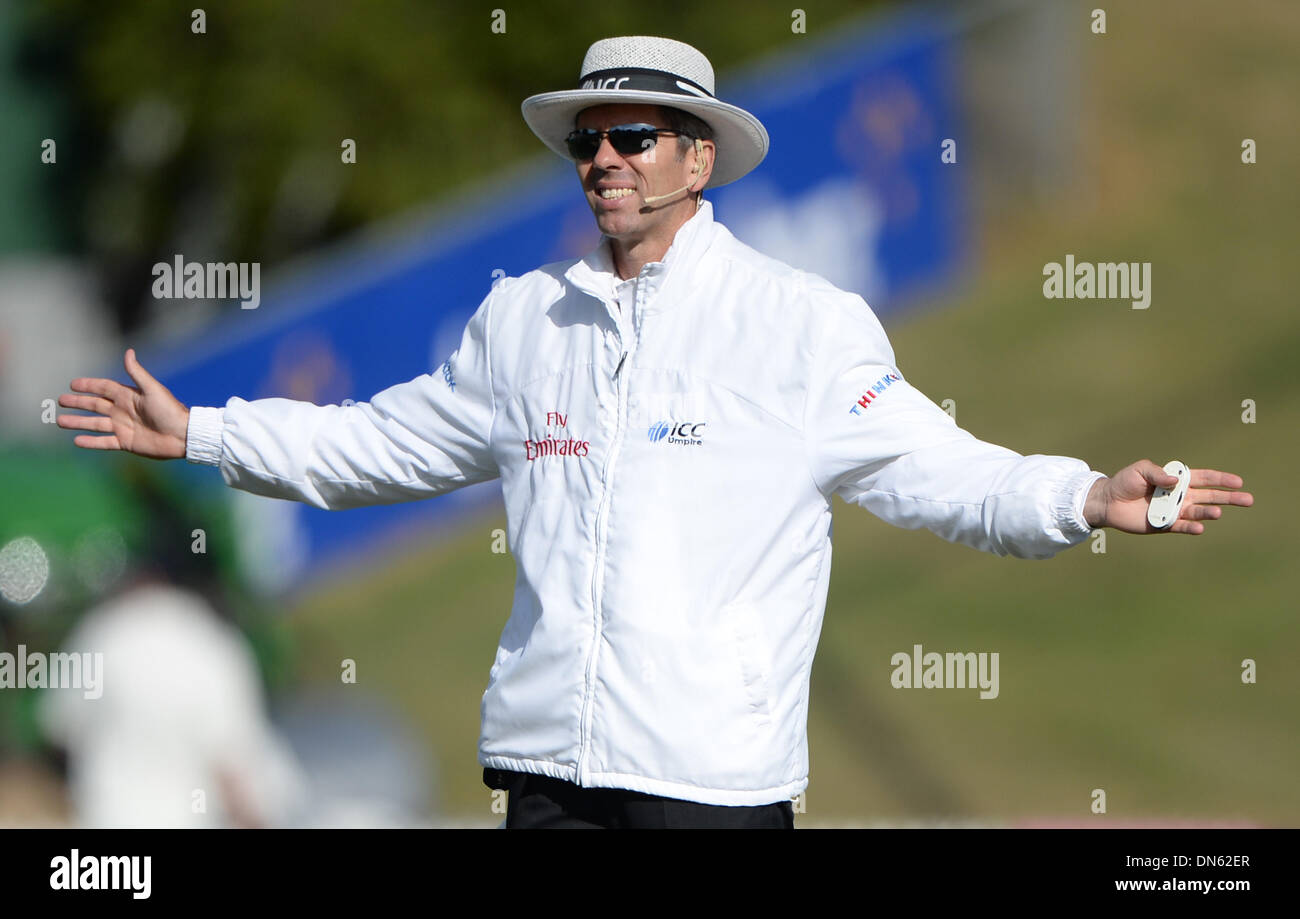 Hamilton, New Zealand. 19th Dec, 2013. Umpire Nigel Llong calls a wide ...