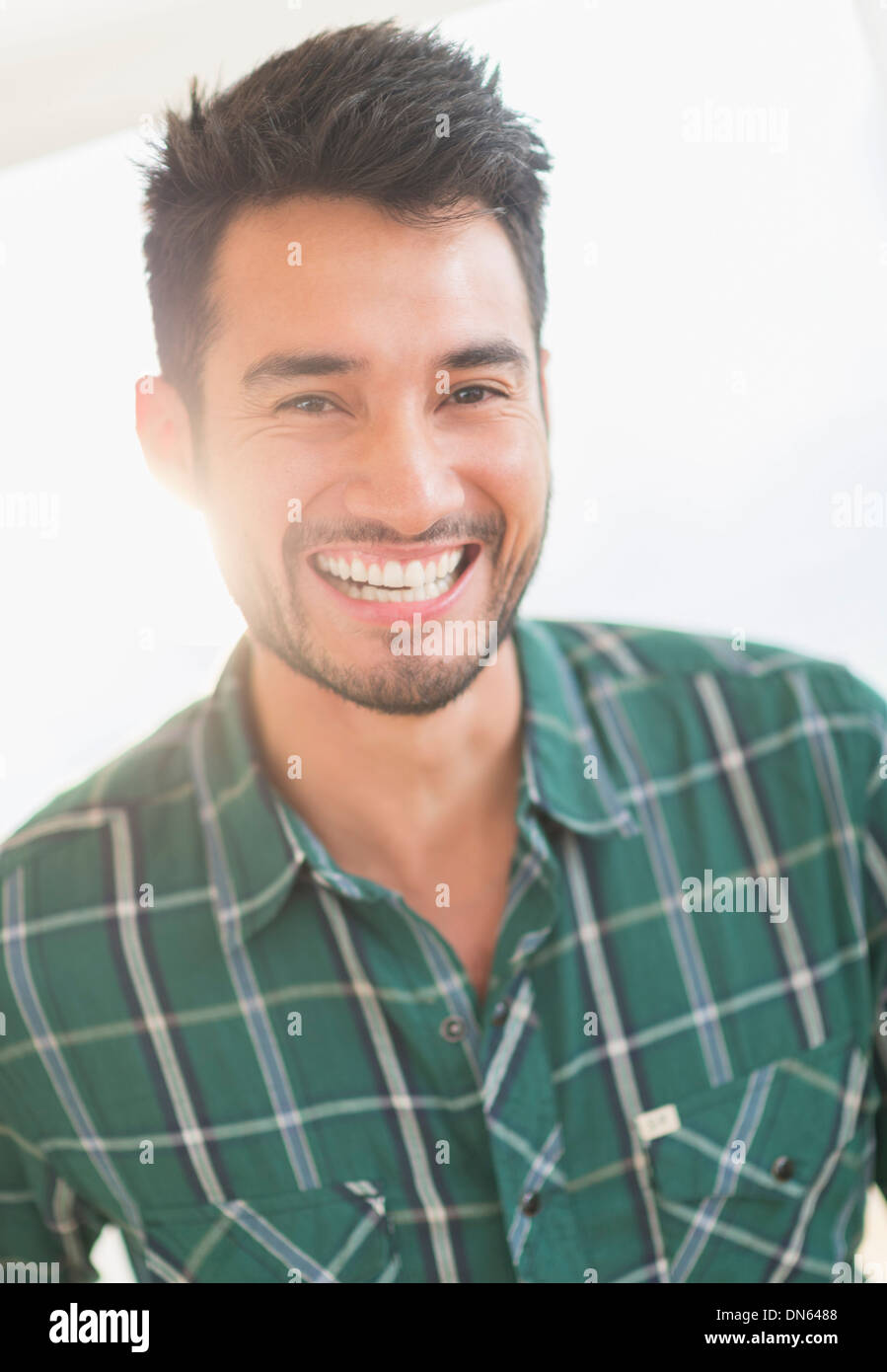 Mixed race man smiling Stock Photo - Alamy
