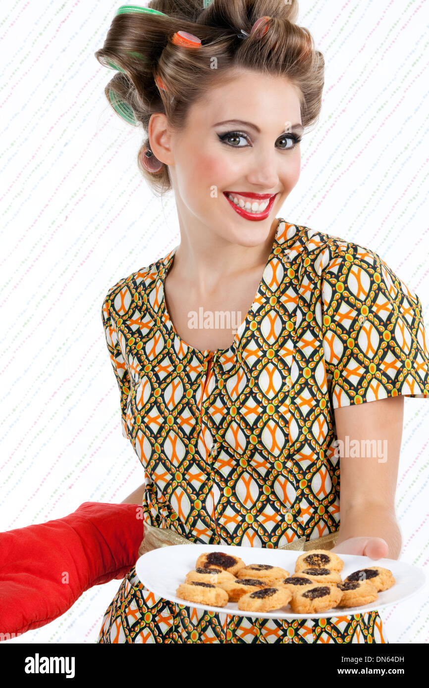 Retro Woman with Cookies Stock Photo - Alamy
