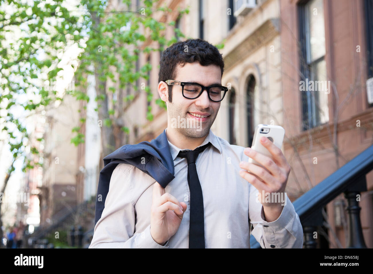Businessman using cell phone outside hi-res stock photography and ...