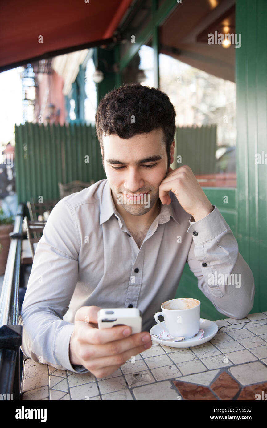 Hispanic young man checking hi-res stock photography and images - Alamy