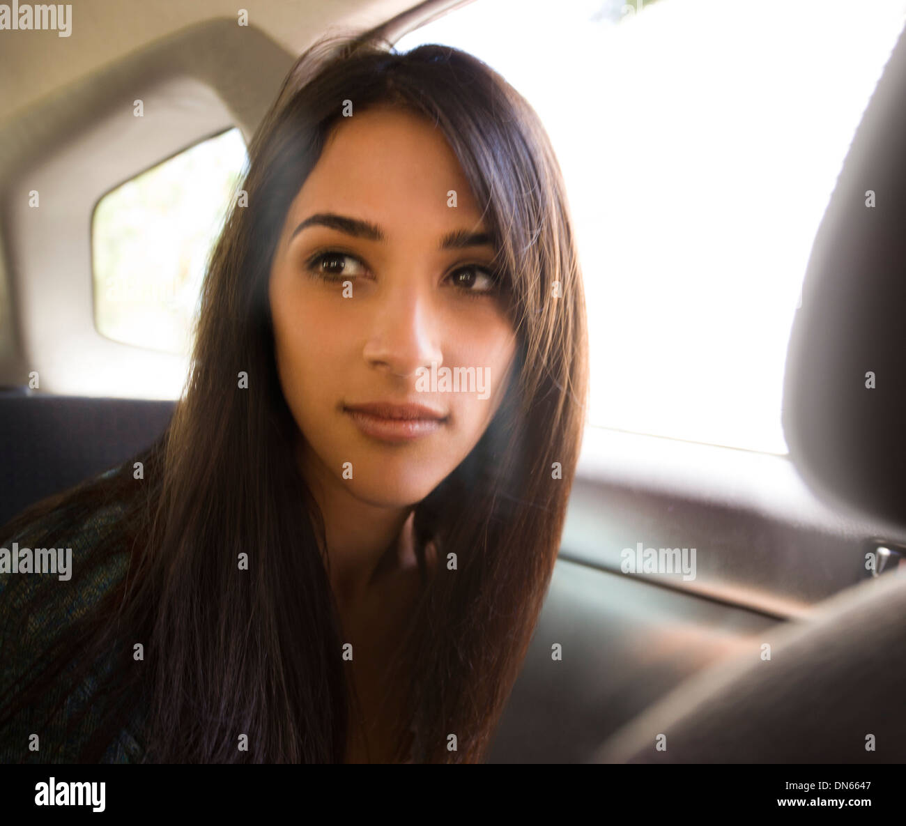 Unknown woman sitting hi-res stock photography and images - Alamy
