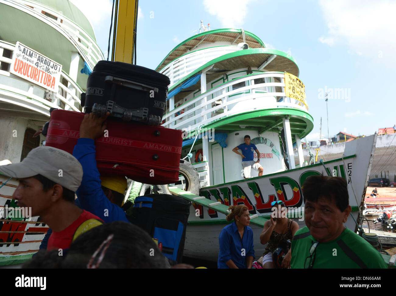 Manaus, Brazil. 11th Dec, 2013. Typical Amazon boats are loaded in the ...
