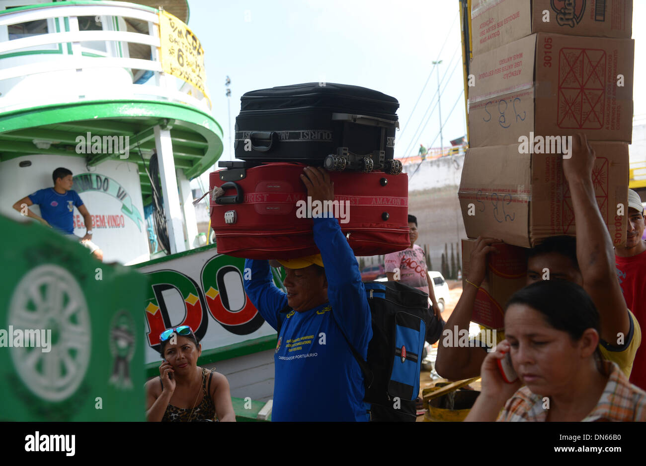 Manaus, Brazil. 11th Dec, 2013. Typical Amazon boats are loaded in the ...
