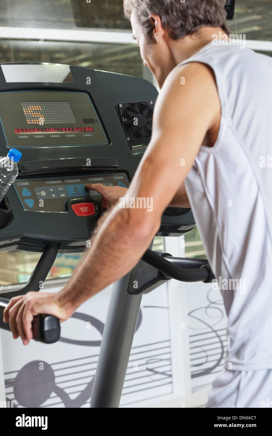 Man pressing button rear view hi-res stock photography and images - Alamy