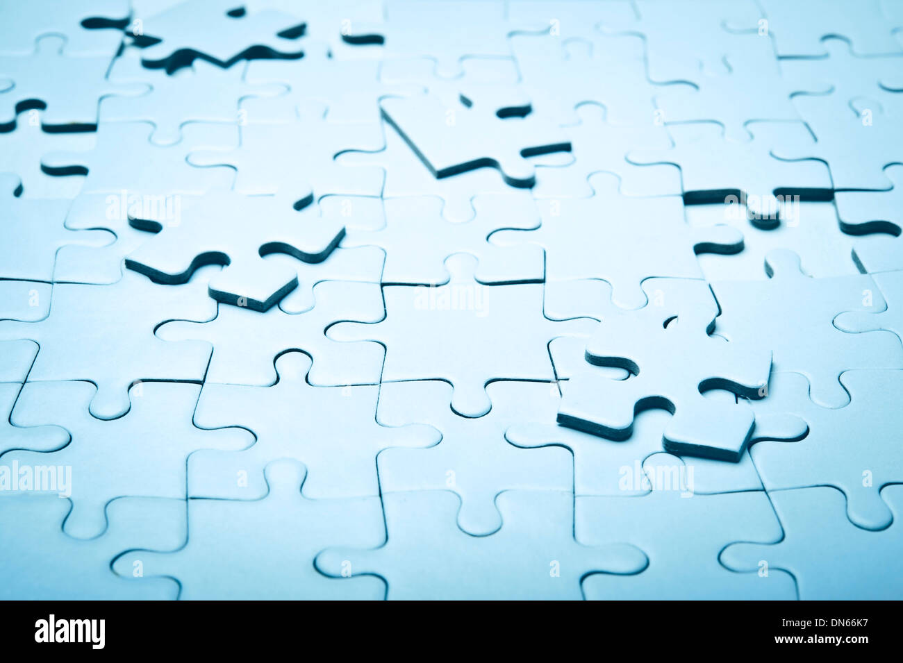 blank jigsaw puzzle, unfinished Stock Photo - Alamy