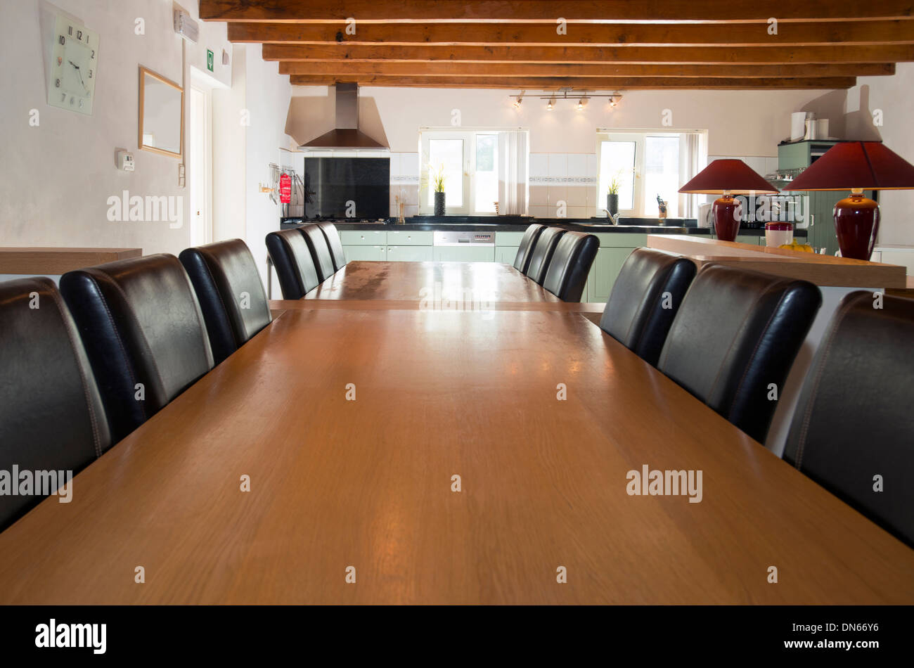 Chairs at empty dining tables Stock Photo - Alamy