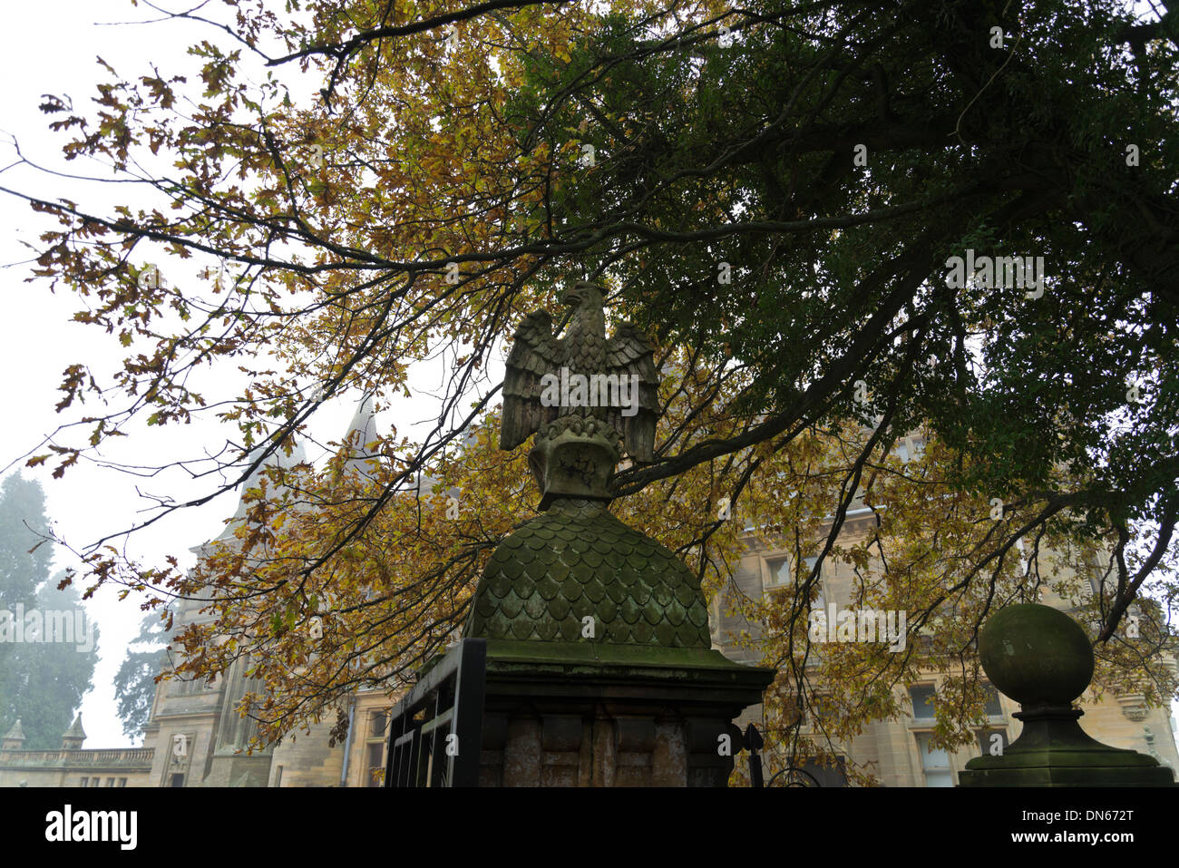Eagle statues atop of entrance gate posts to country houses Stock Photo ...