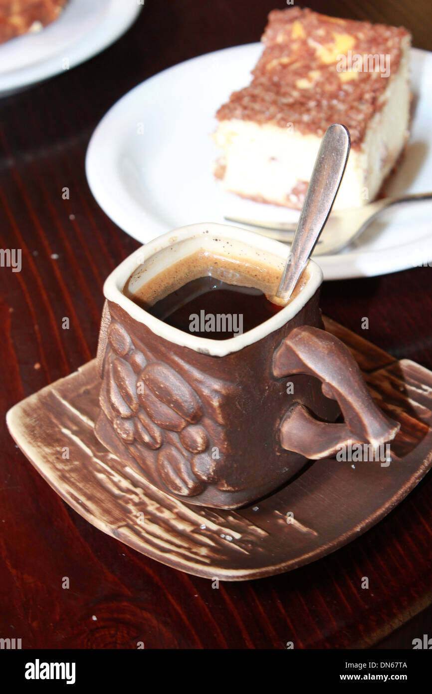 cup of coffee and portion of cake for break Stock Photo - Alamy