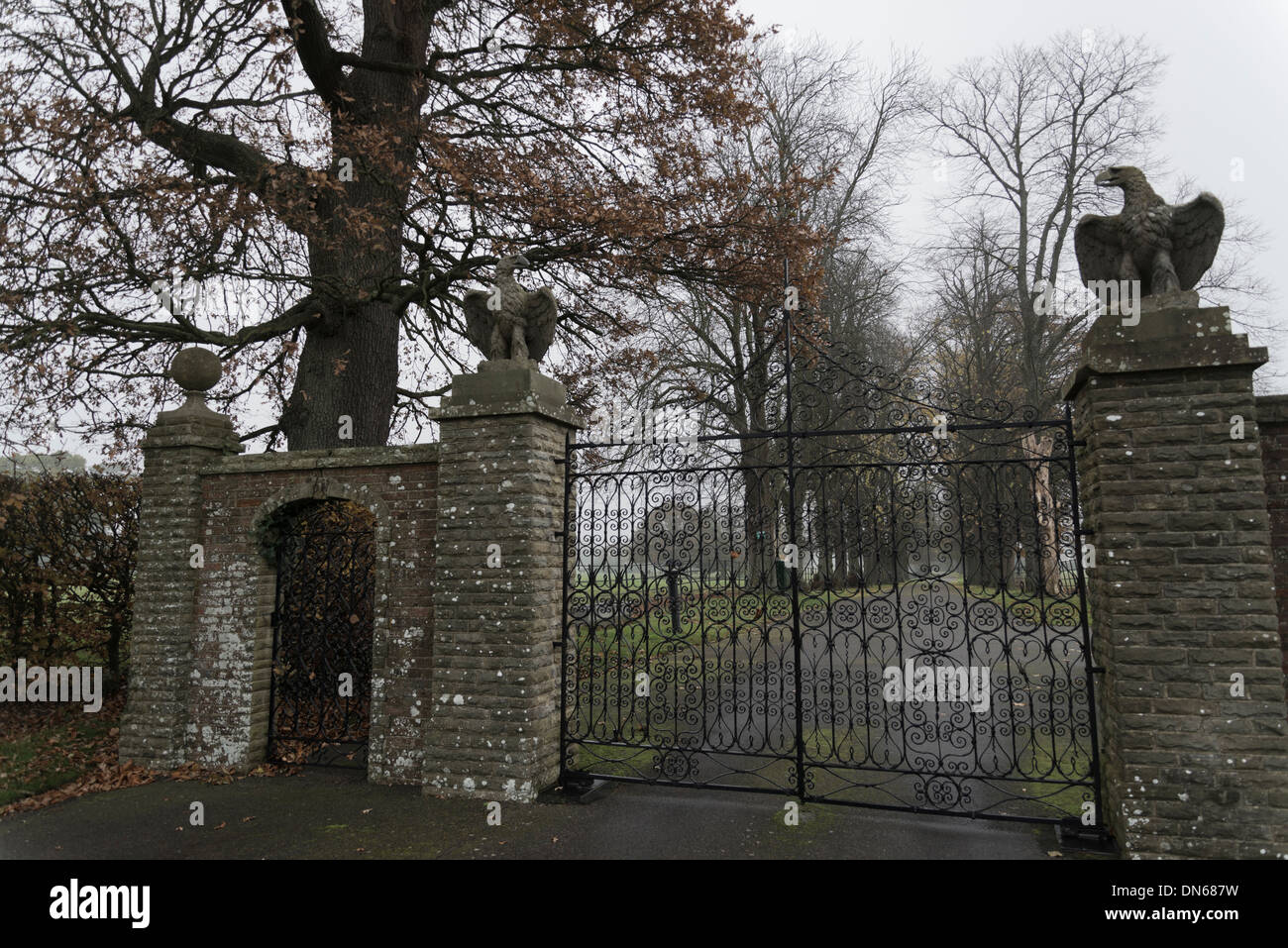 Eagle statues atop of entrance gate posts to country houses Stock Photo ...