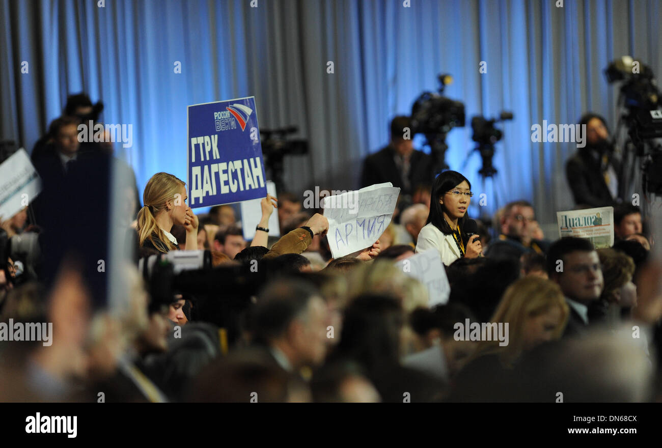 Moscow, Russia. 19th Dec, 2013. A Journalist asks questions to Russian ...