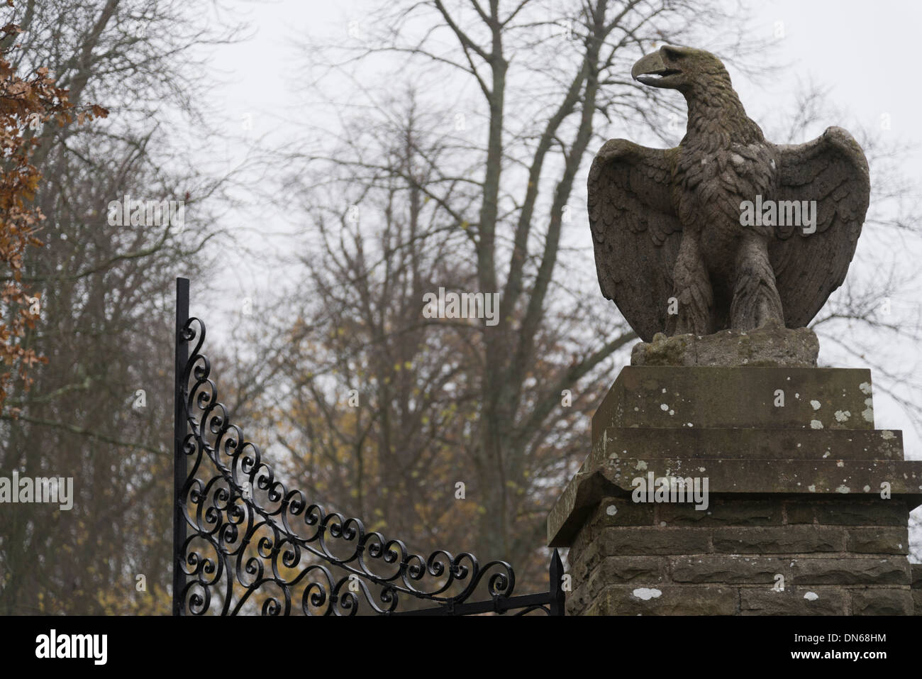 Eagle statues atop of entrance gate posts to country houses Stock Photo ...