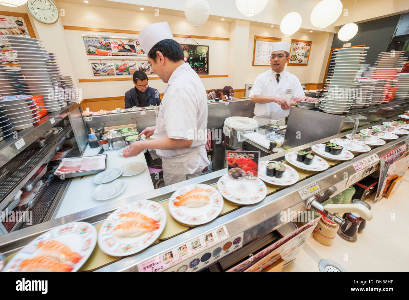 Moving sushi restaurant hi-res stock photography and images - Alamy