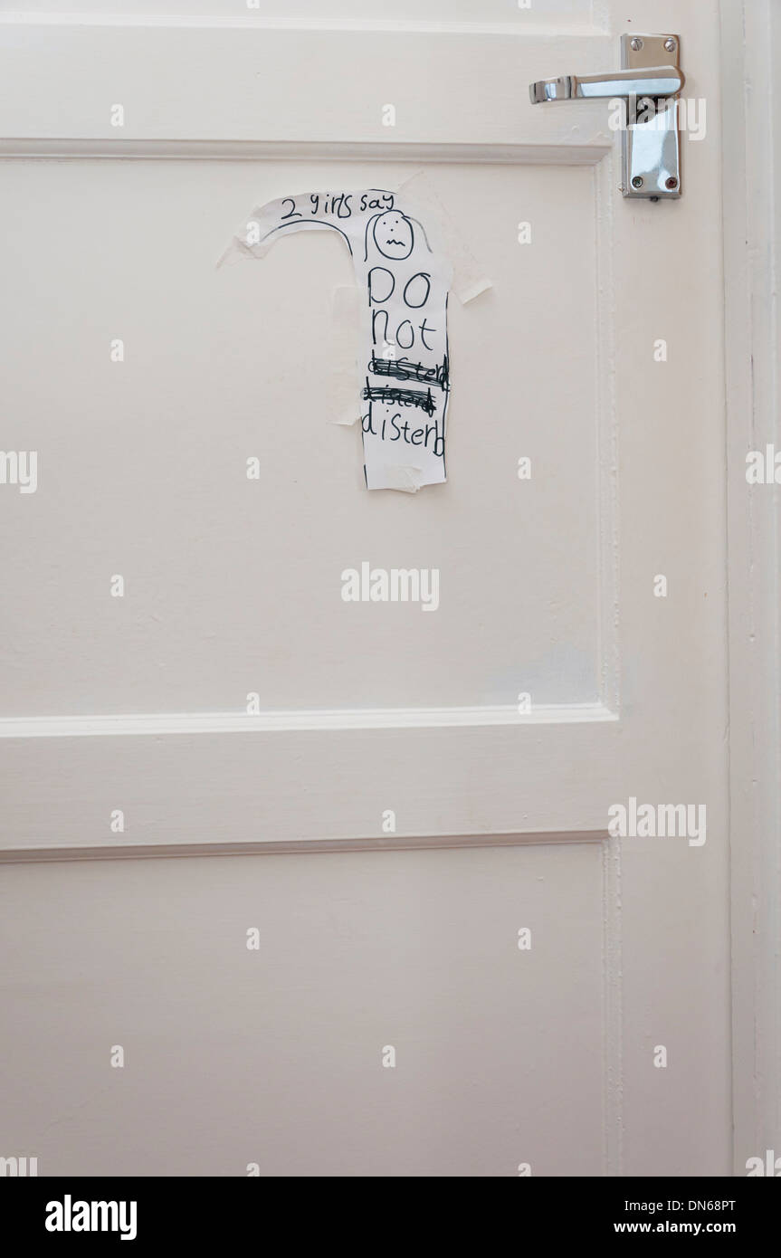 Do not disturb sign made by young children on their bedroom door Stock ...