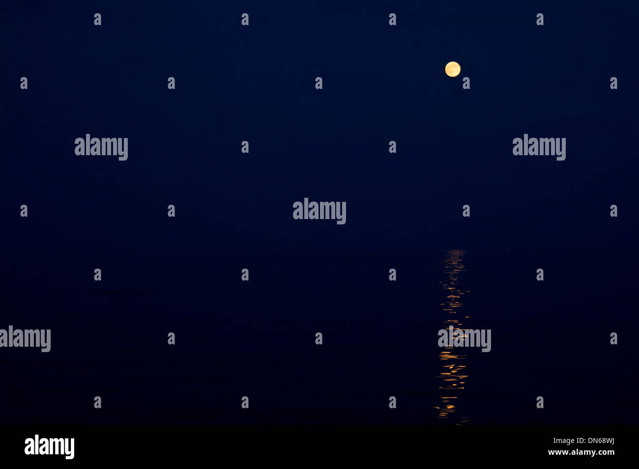 Moon over ocean sea Stock Photo - Alamy