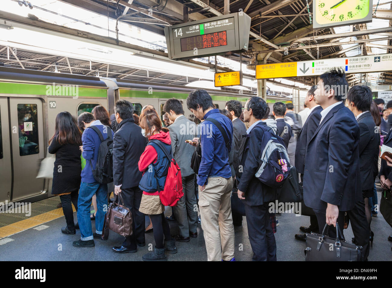Tokyo crowds passengers hi-res stock photography and images - Alamy