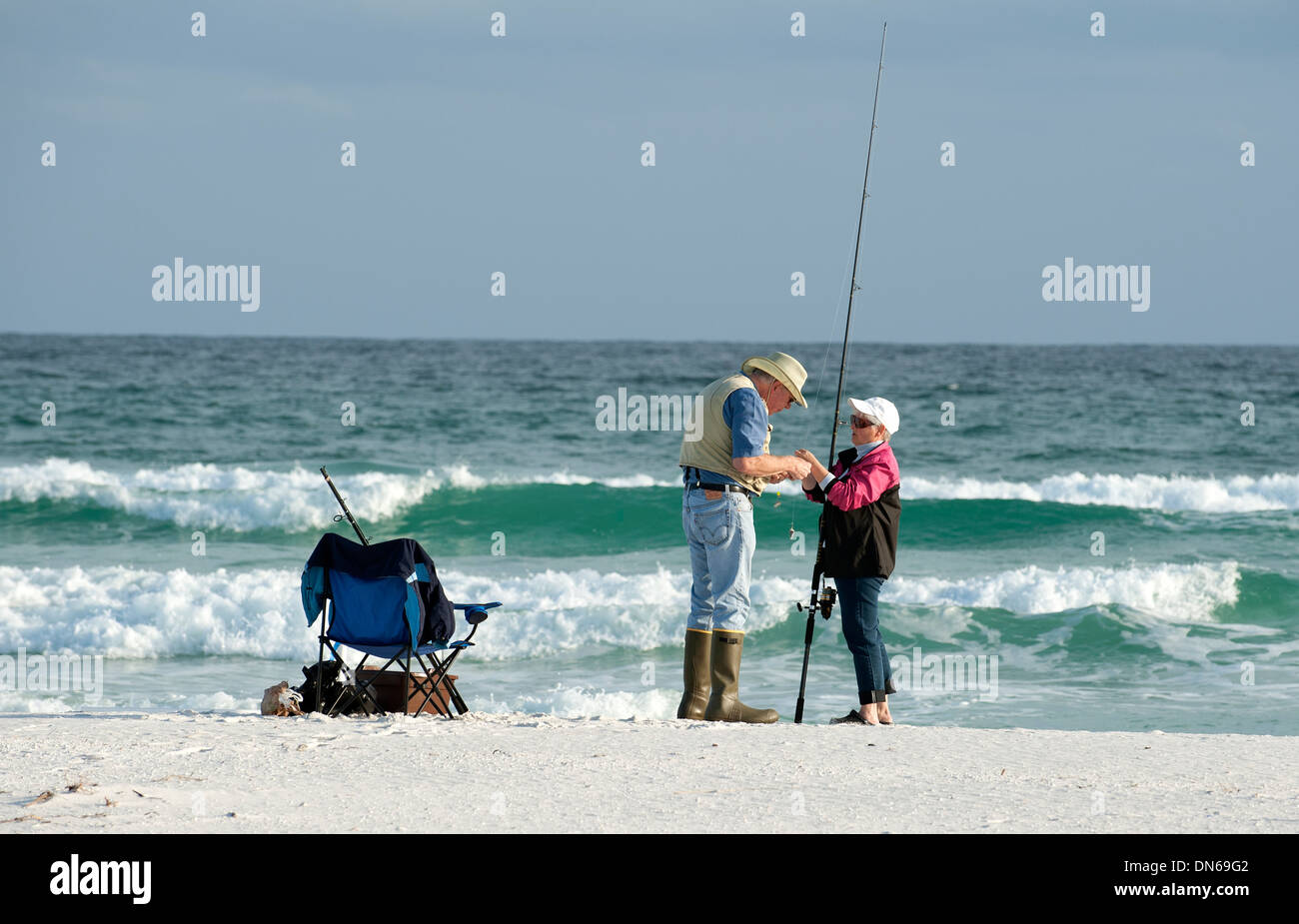 Elderly couple fishing on Pensacola Beach in the Panhandle region of ...