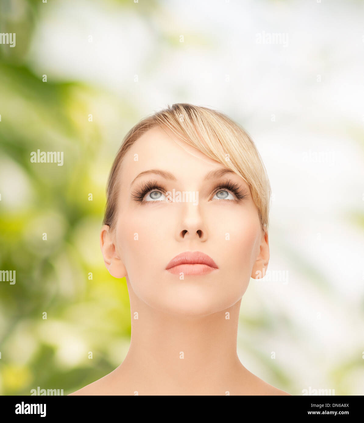 beautiful woman looking up Stock Photo - Alamy