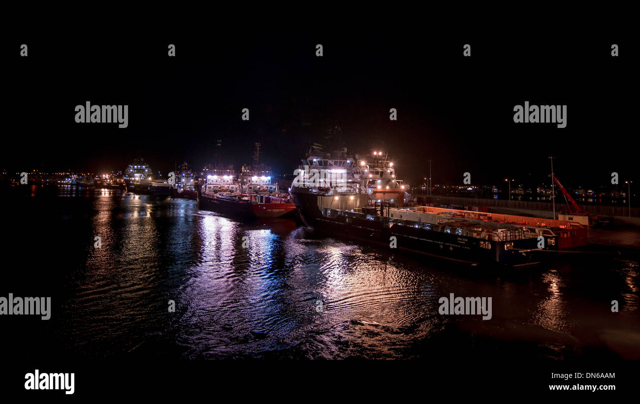 Offshore vessels in a dutch harbor at night Stock Photo - Alamy