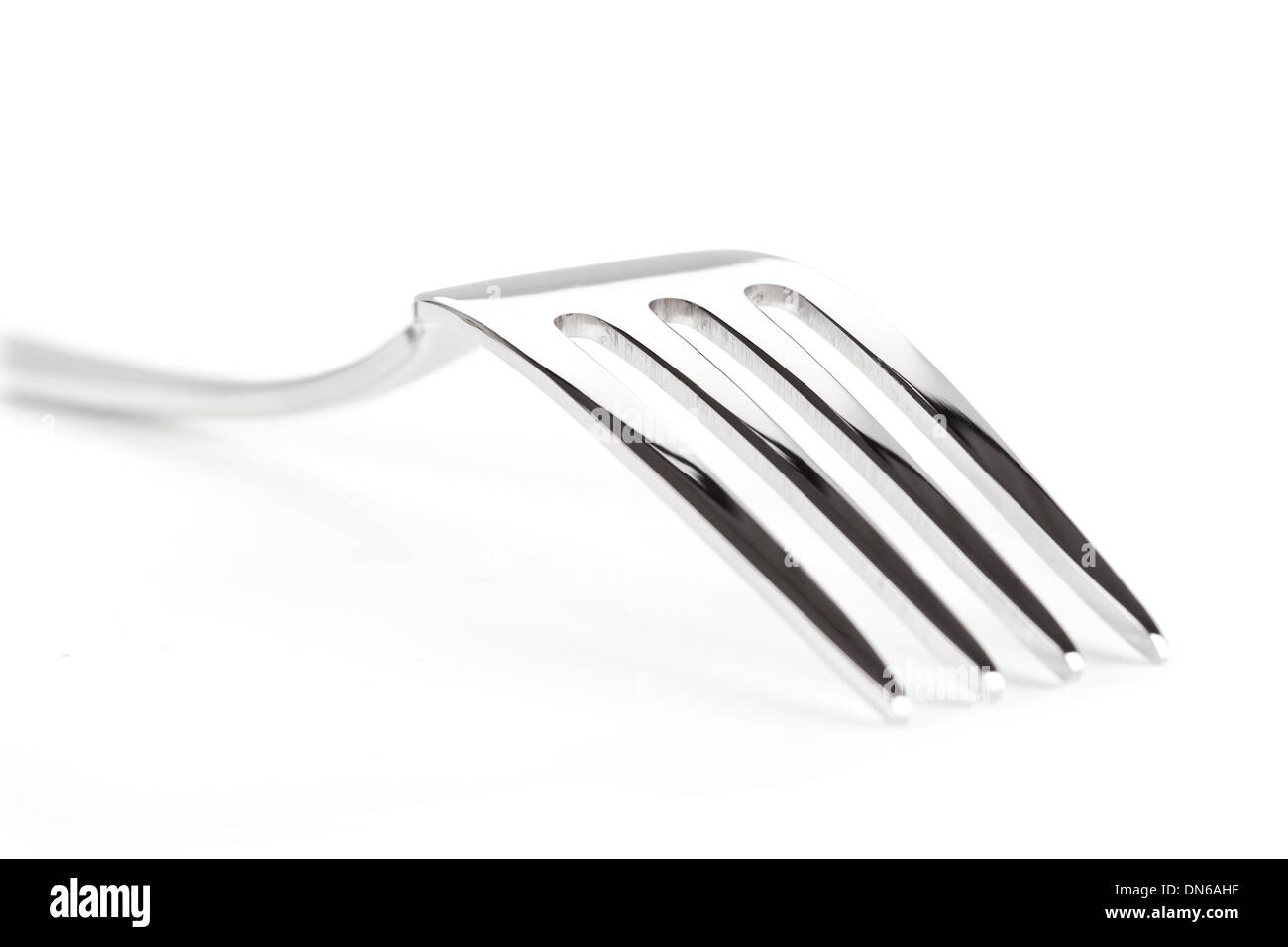 Fork closeup on white Stock Photo - Alamy