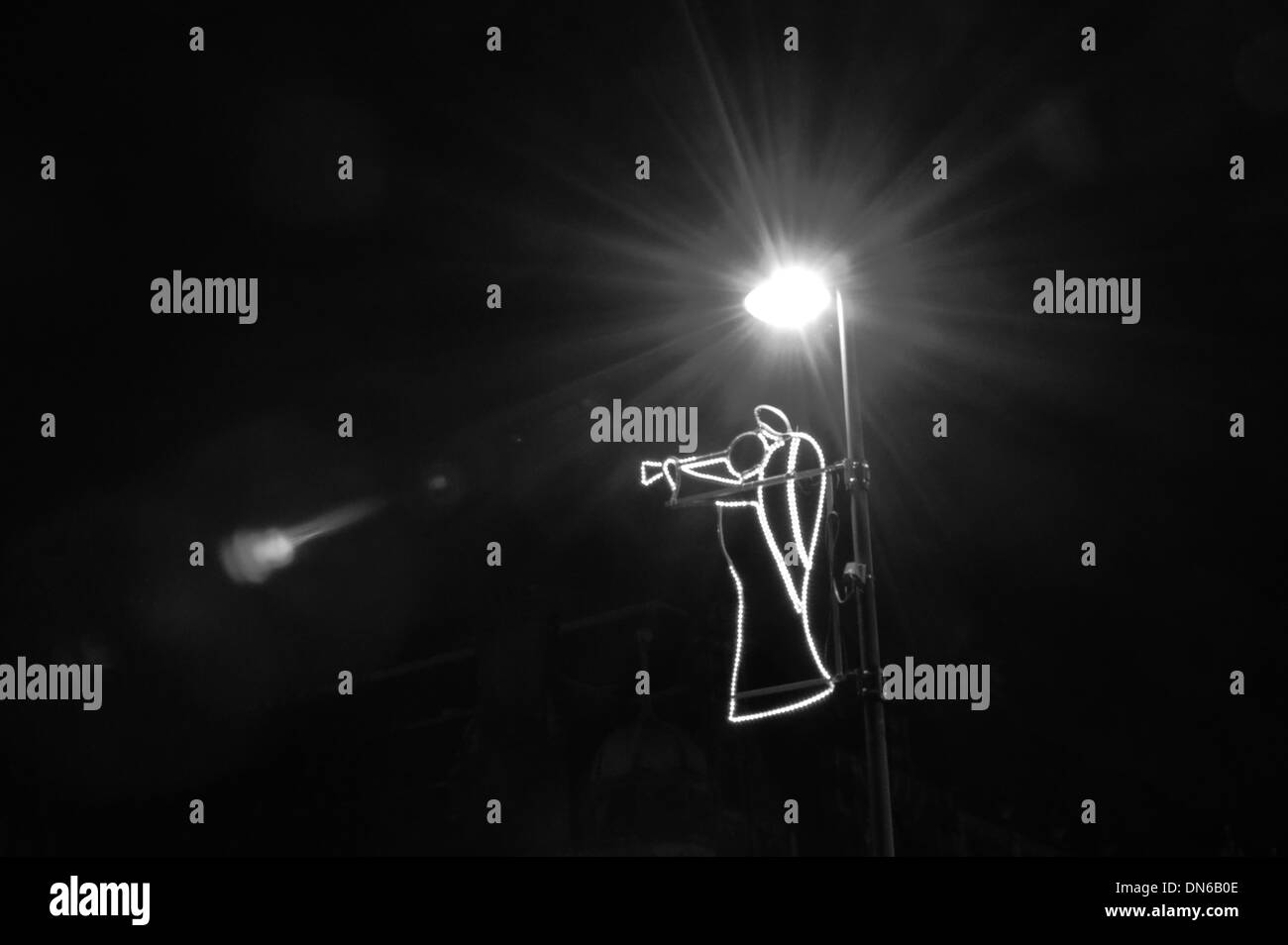 Angel in lights Black and White Stock Photos & Images - Alamy